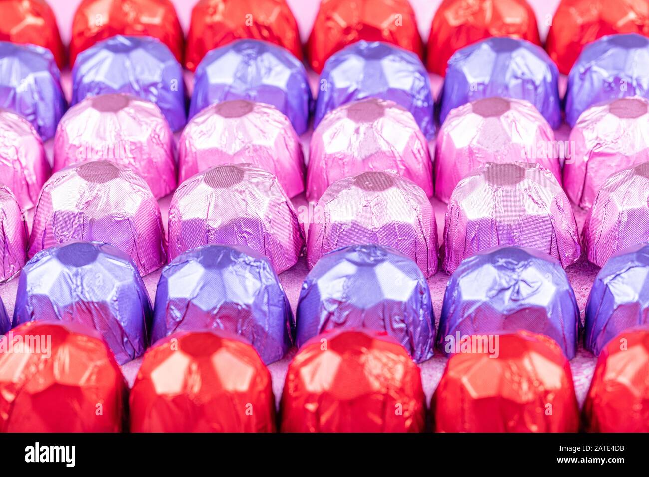 Chocolates in foil. Sweets to cheer you up. Tasty sweets are a ...