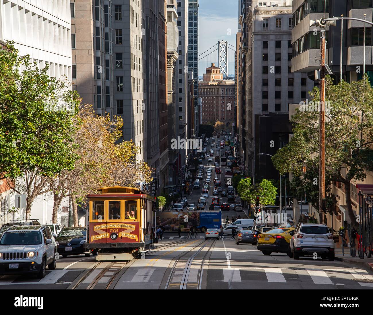 Classic view of historic traditional Cable Cars riding on famous ...
