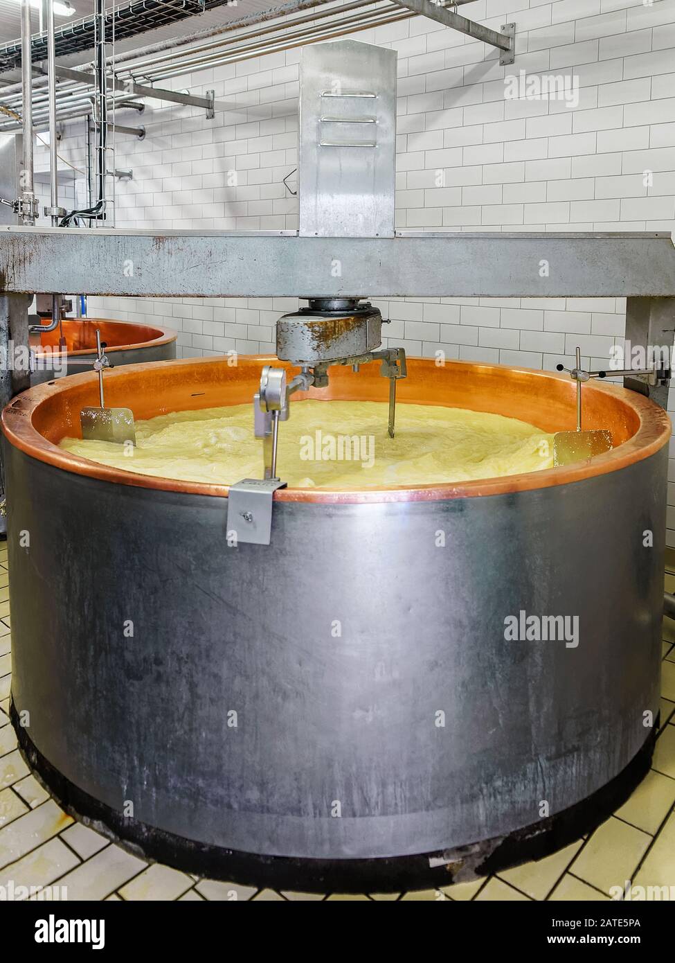 Production of Gruyere de Comte Cheese at dairy France Stock Photo - Alamy