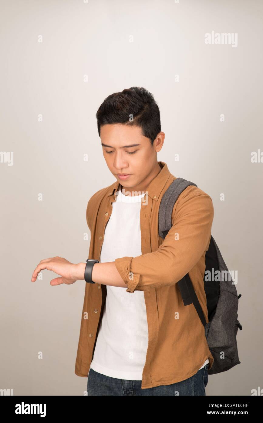 Man watching clock hi-res stock photography and images - Alamy