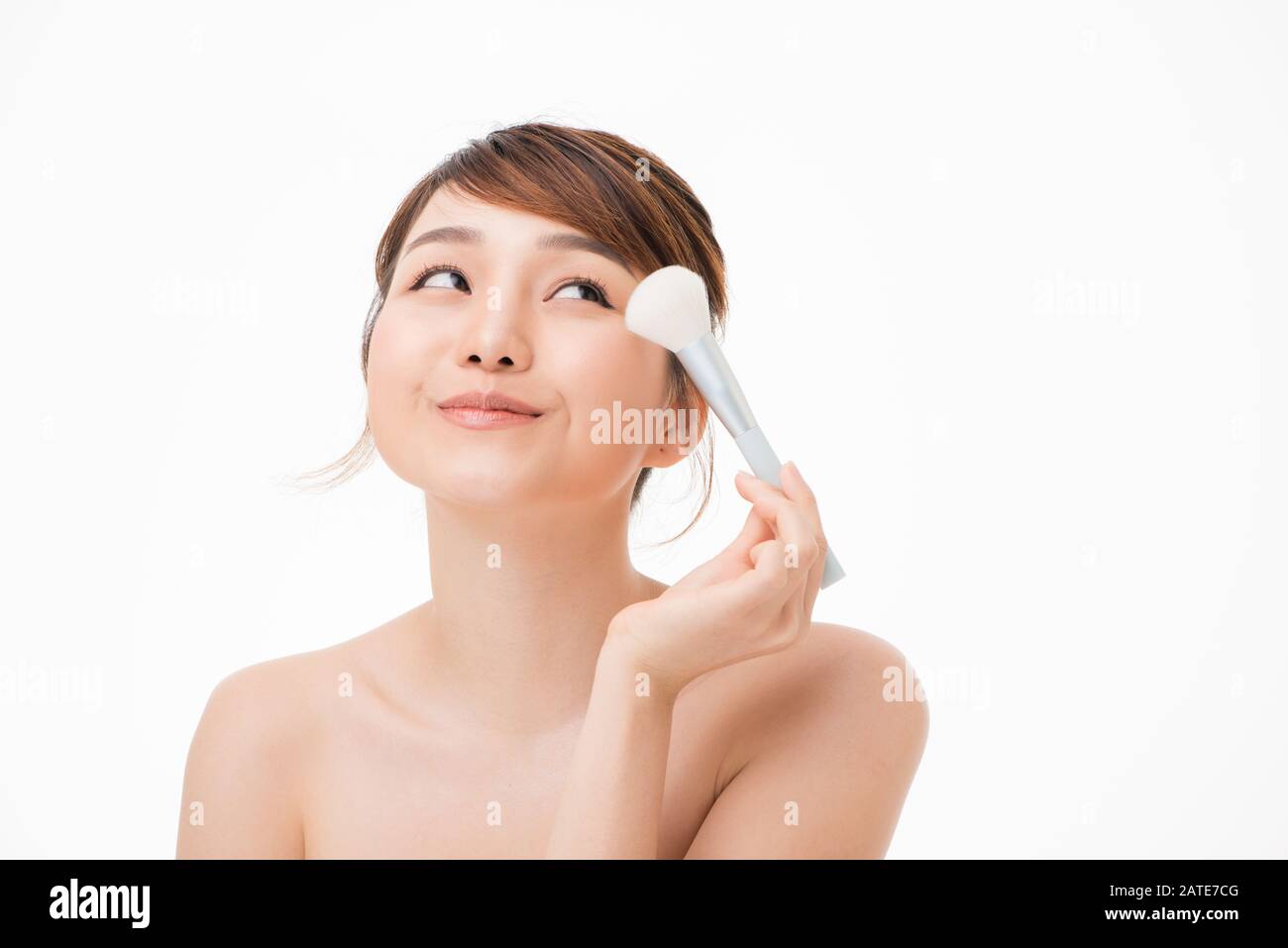 Beauty portrait young asian woman smile with brush cheek skin care and ...