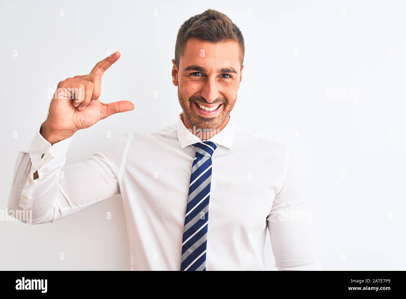 Young handsome elegant business man over isolated background smiling ...