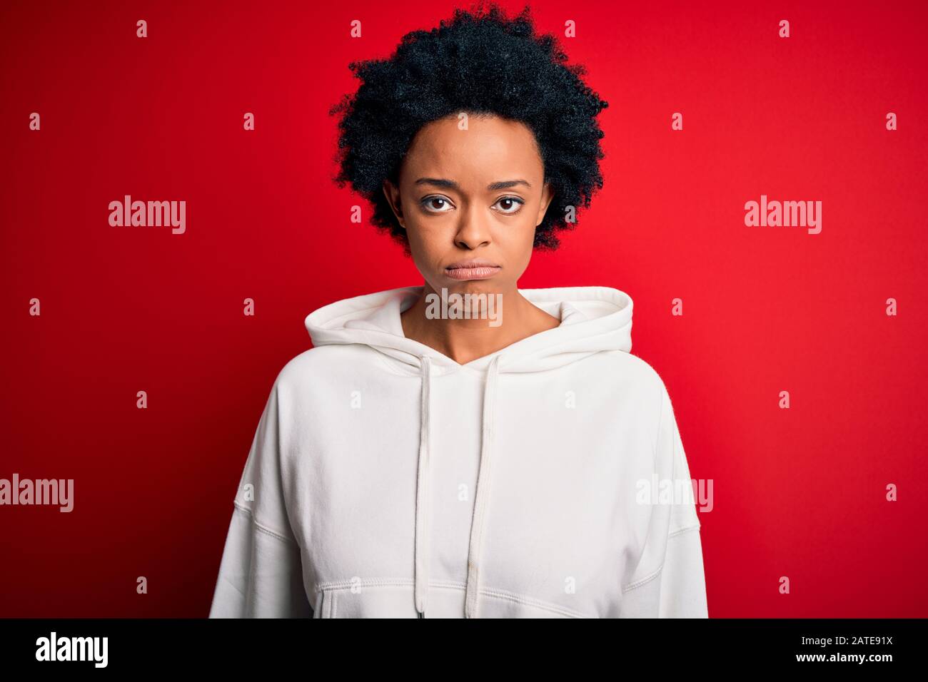 Young beautiful African American afro sportswoman with curly hair ...