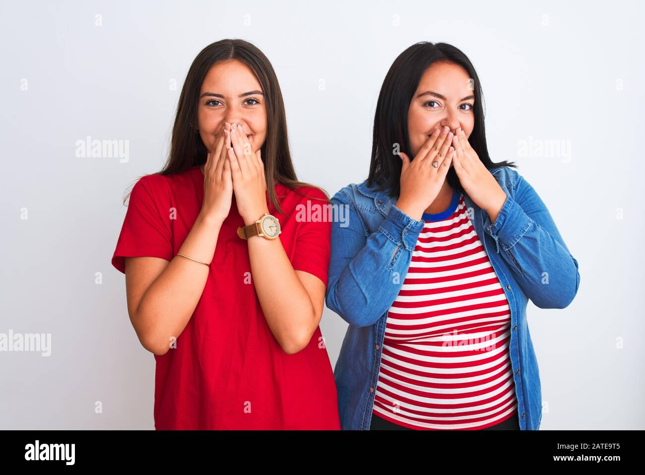 Young beautiful women wearing casual clothes standing over isolated ...