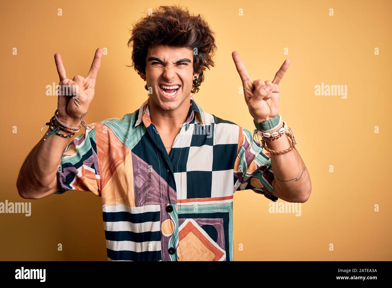 Young handsome man on vacation wearing summer shirt over isolated ...