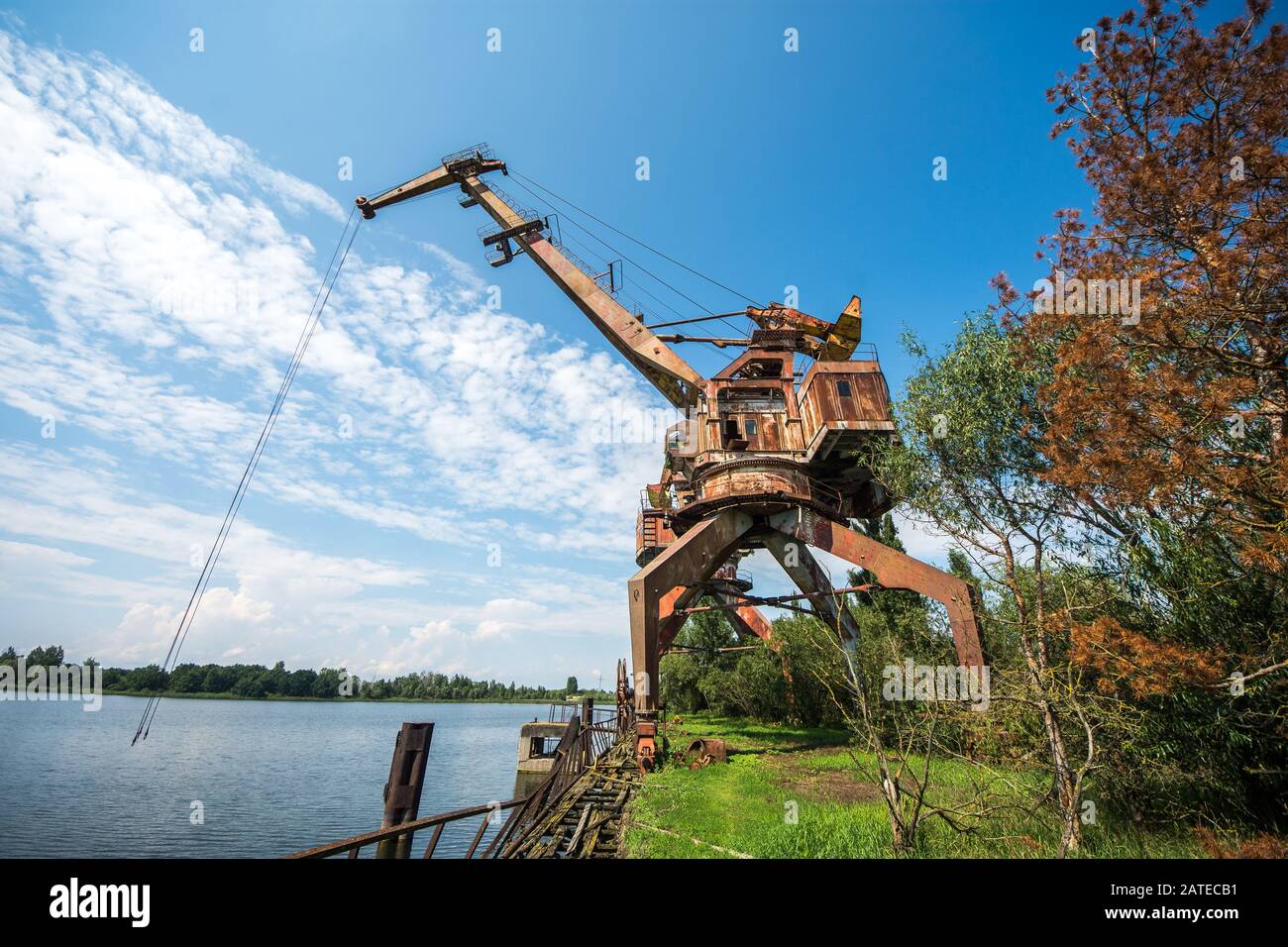 Old crane over Yanov Backwater in Chernobyl Exclusion Zone, Ukraine ...