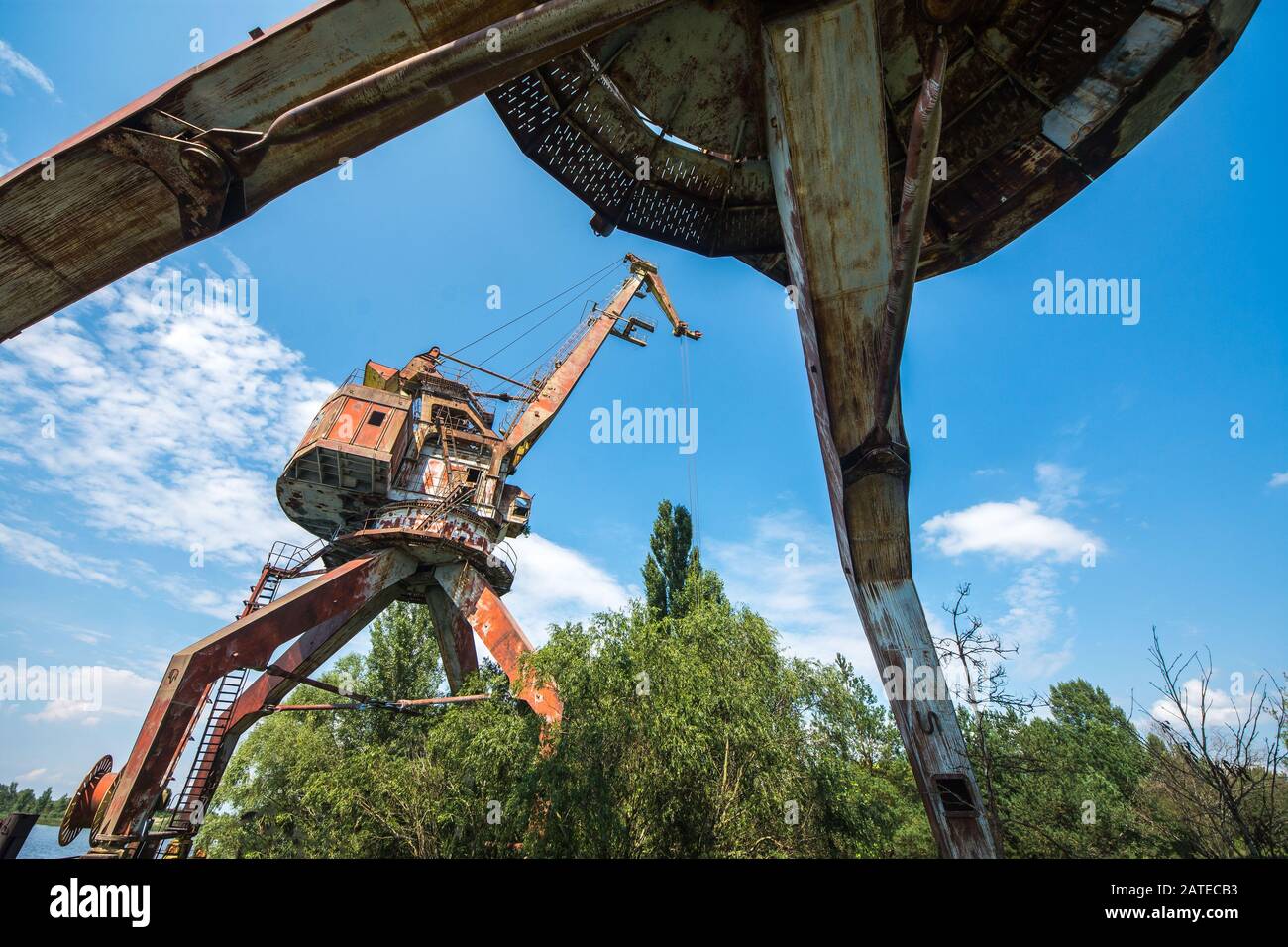 Old crane over Yanov Backwater in Chernobyl Exclusion Zone, Ukraine ...