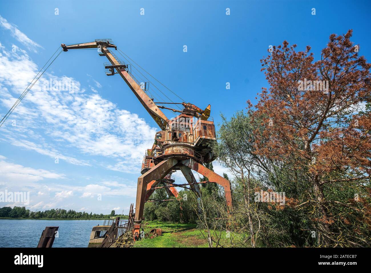 Old crane over Yanov Backwater in Chernobyl Exclusion Zone, Ukraine ...