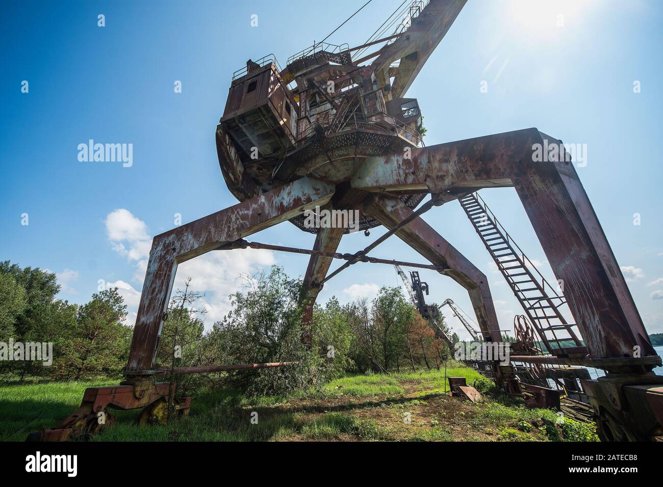 Old crane over Yanov Backwater in Chernobyl Exclusion Zone, Ukraine ...