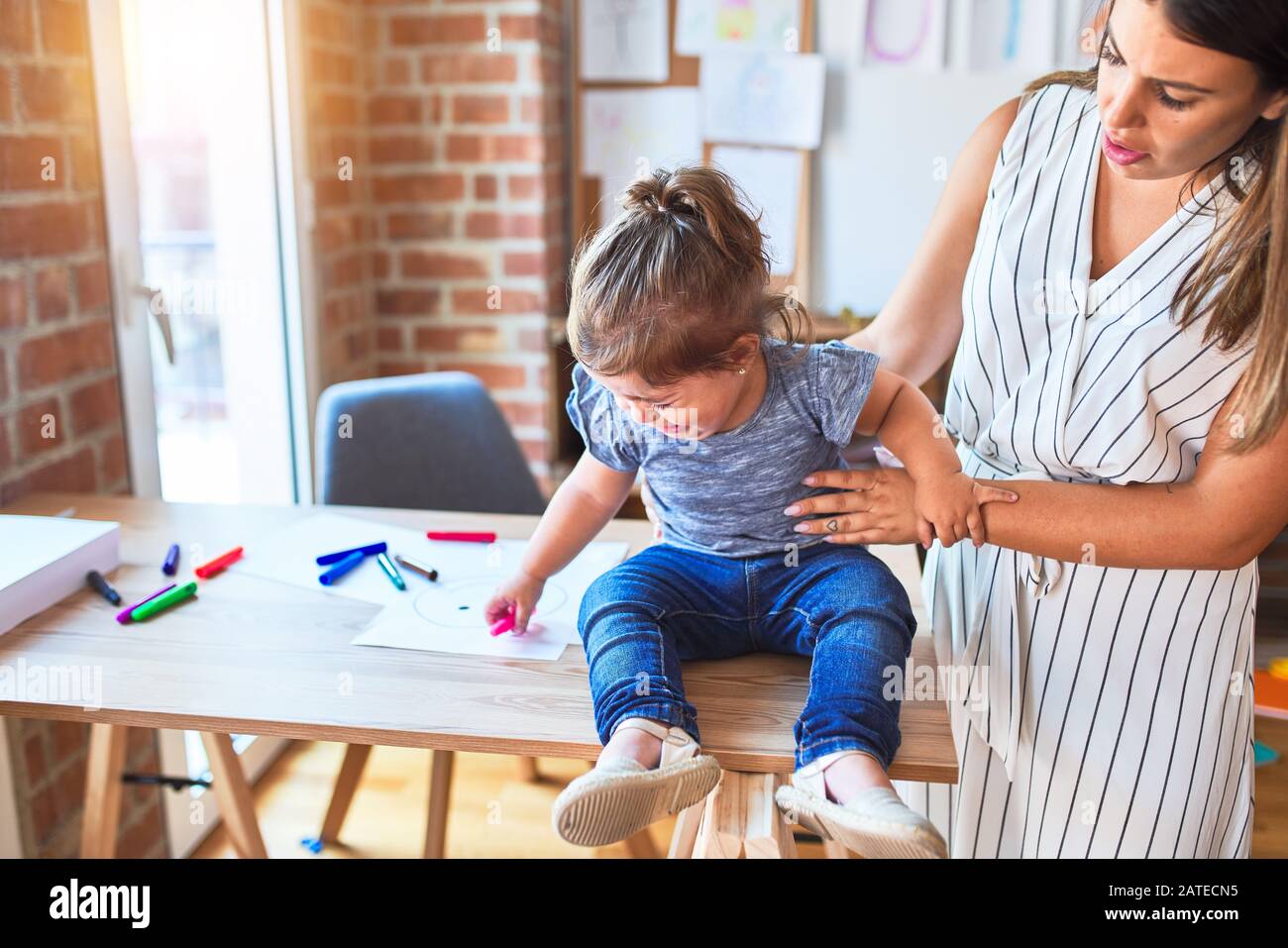Kid crying teacher hi-res stock photography and images - Alamy
