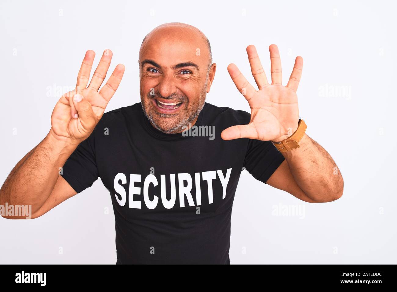 Middle age safeguard man wearing security uniform standing over ...