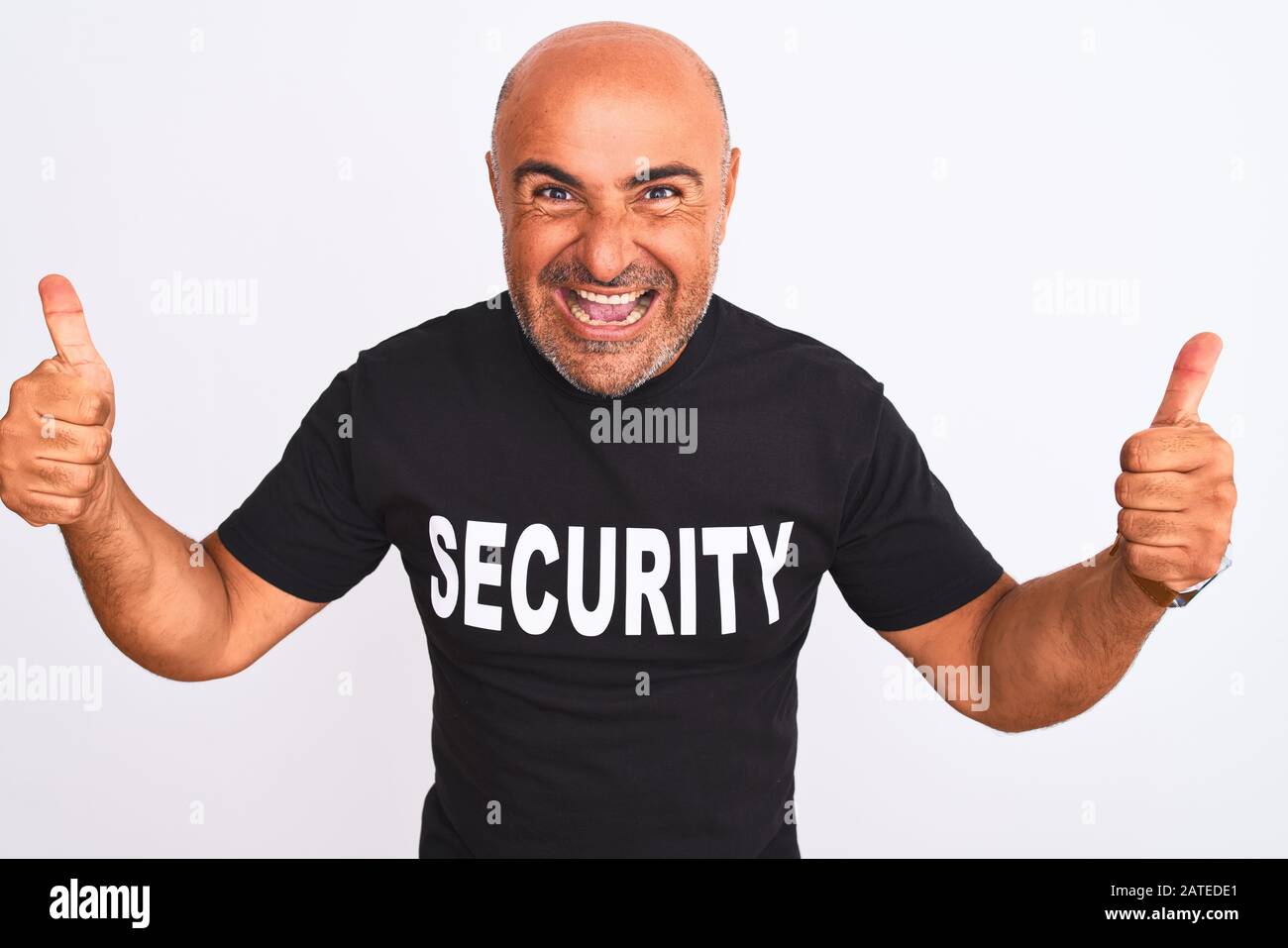 Middle age safeguard man wearing security uniform standing over ...