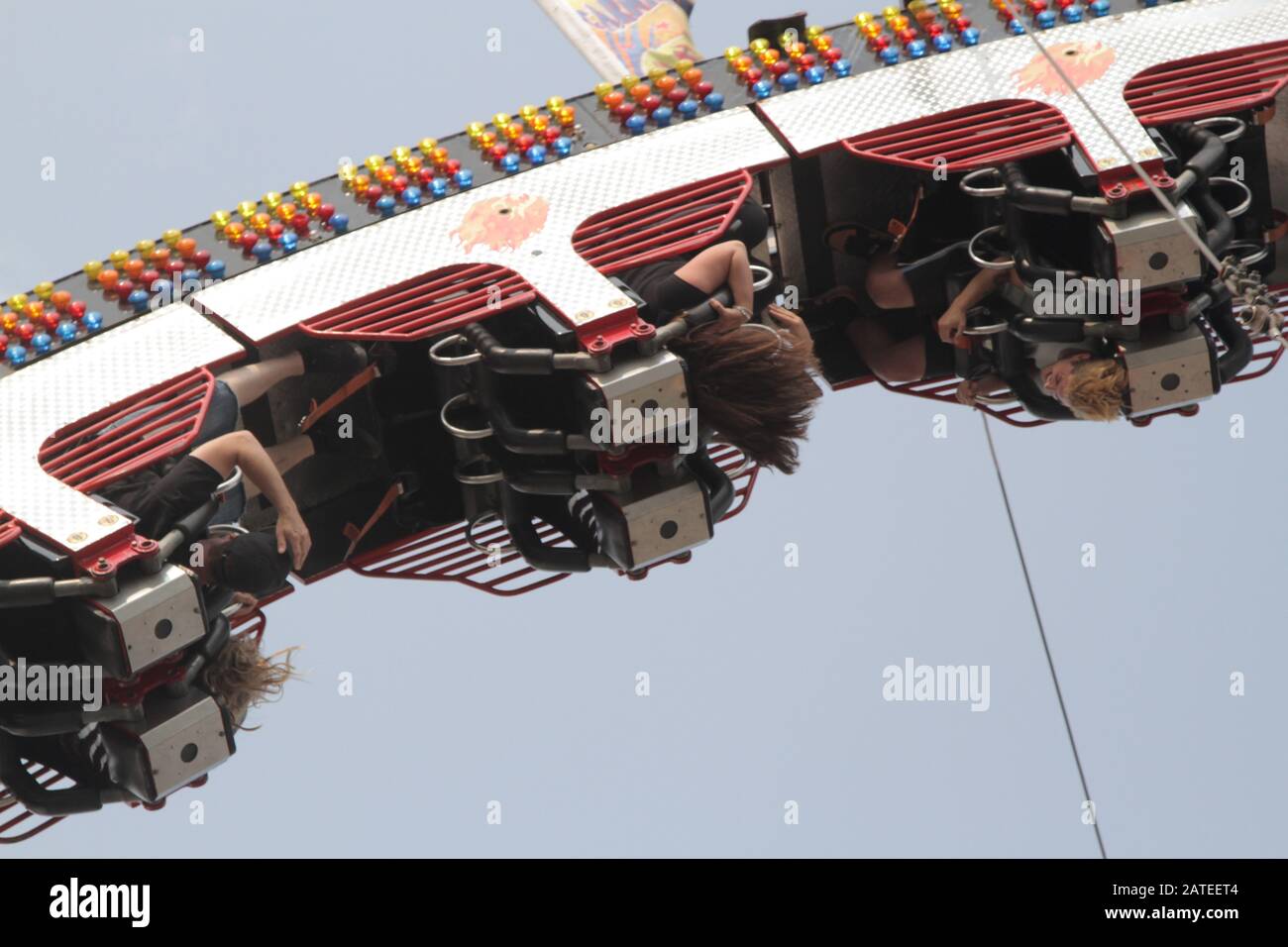 Closeup of upside down roller coaster in a fair Stock Photo - Alamy