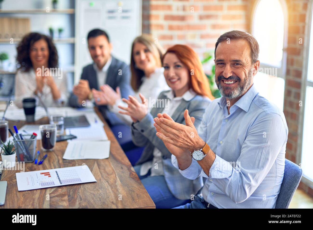 Group of business workers smiling happy and confident. Working together ...