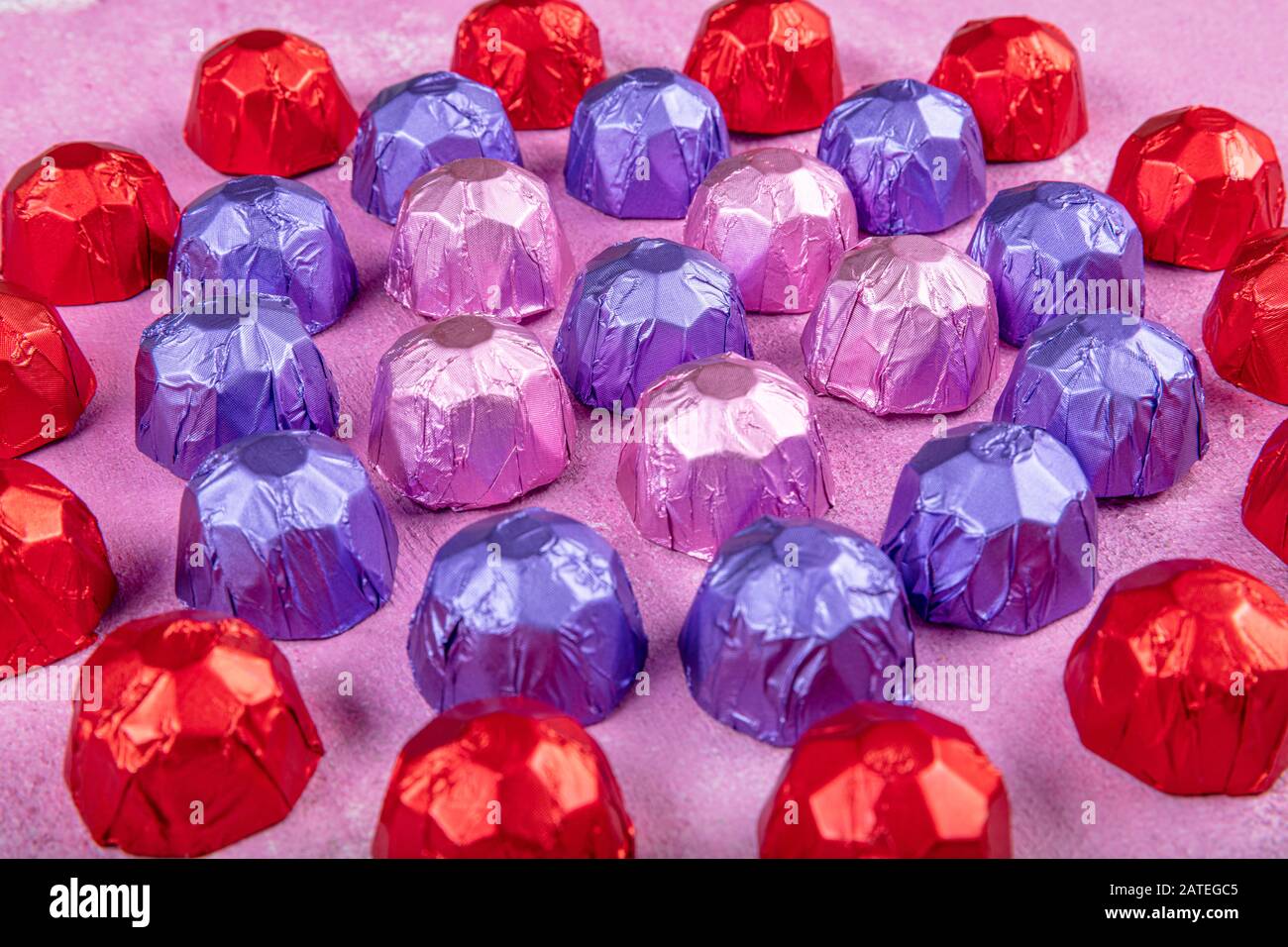 Chocolates in foil. Sweets to cheer you up. Tasty sweets are a ...