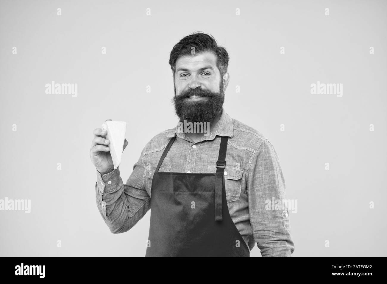 Cheese maker. Bearded man in apron hold piece cheese. Cheese making ...