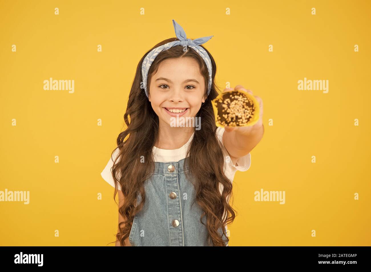 Happy childhood. Bakery confectionery concept. Kid girl hold muffin ...