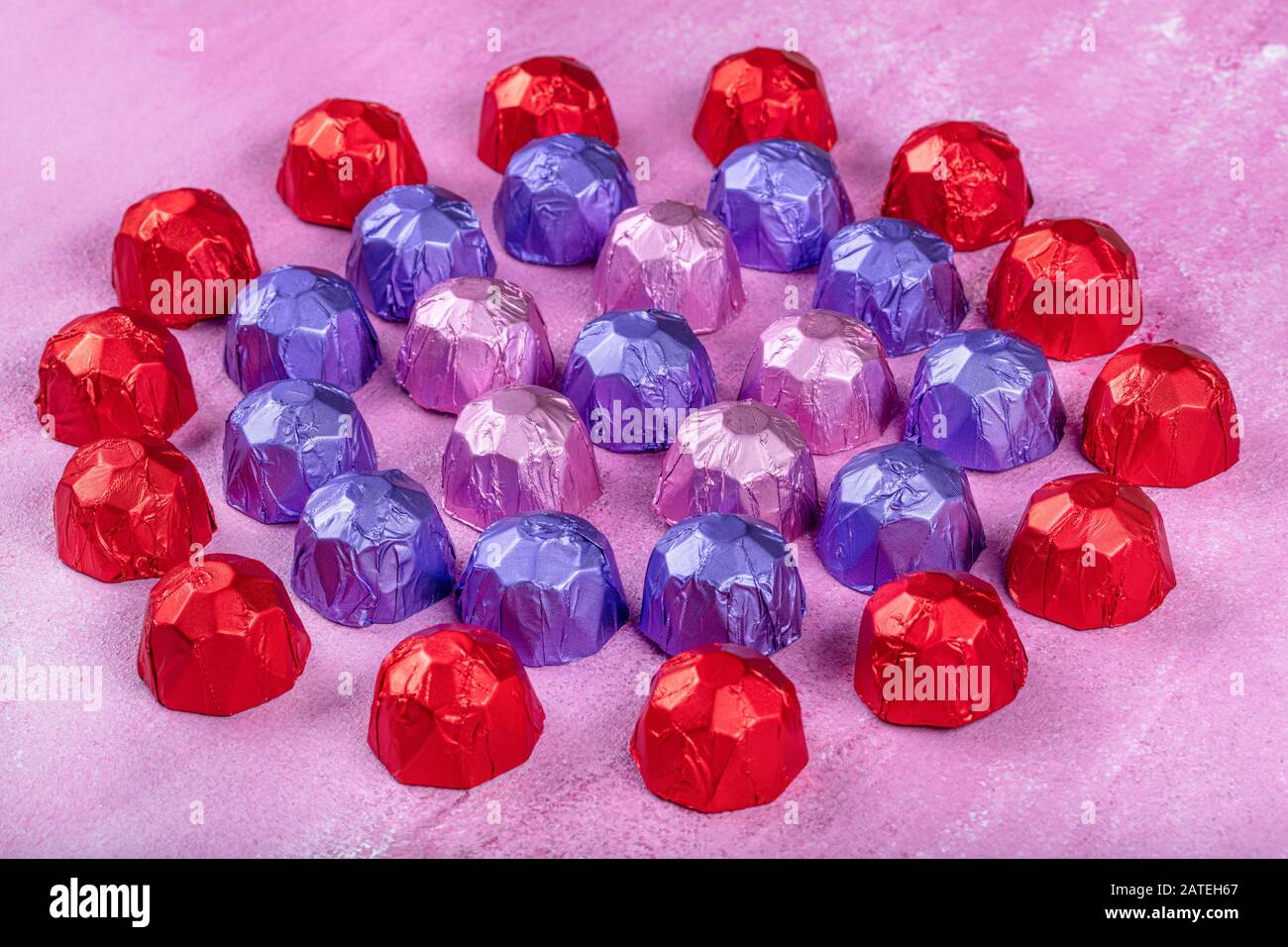 Chocolates in foil. Sweets to cheer you up. Tasty sweets are a ...