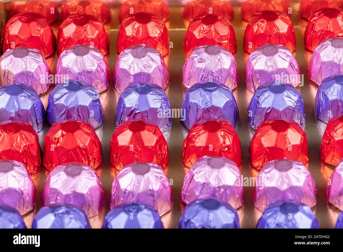 Chocolates in foil. Sweets to cheer you up. Tasty sweets are a ...