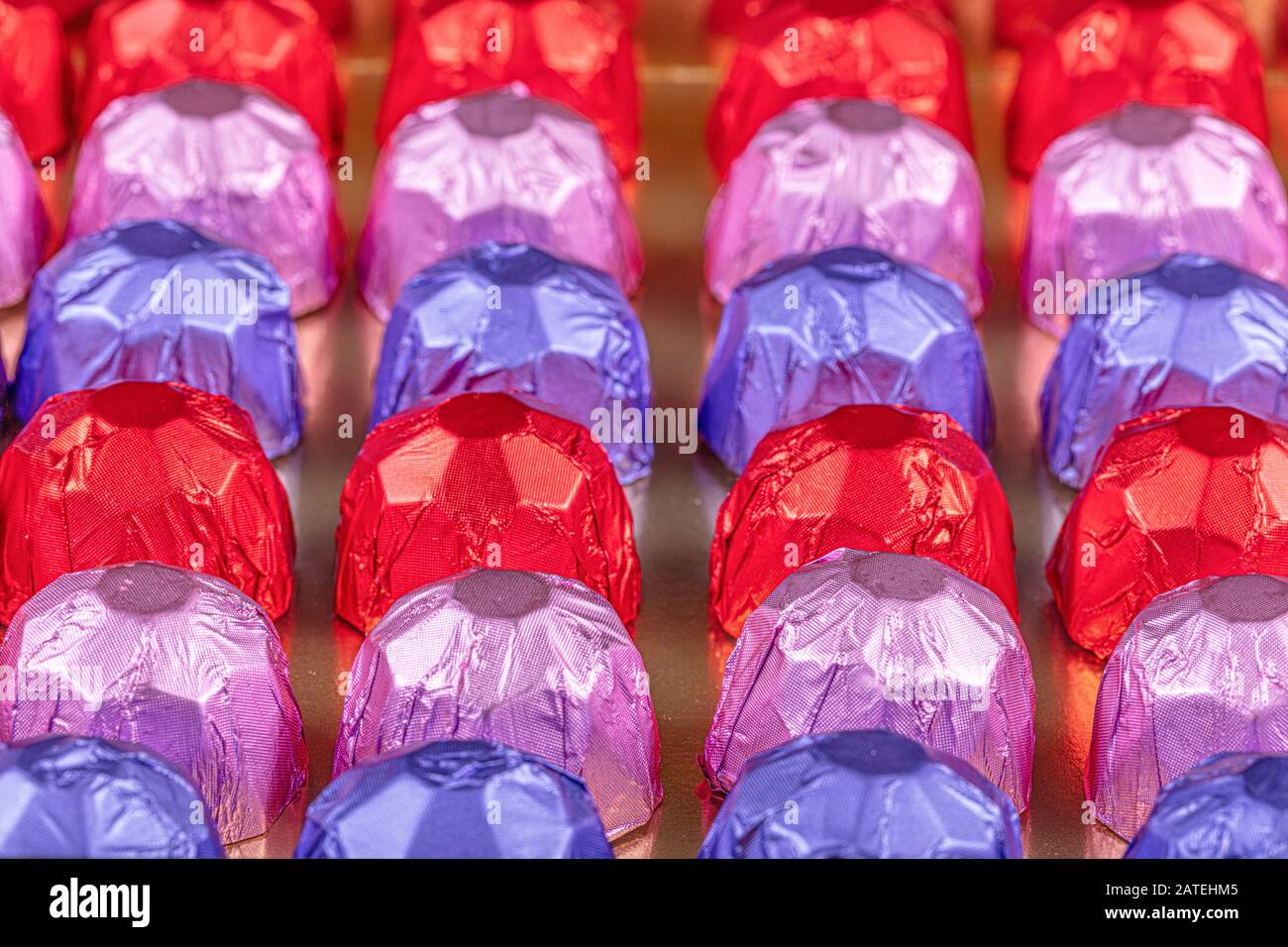 Chocolates in foil. Sweets to cheer you up. Tasty sweets are a ...