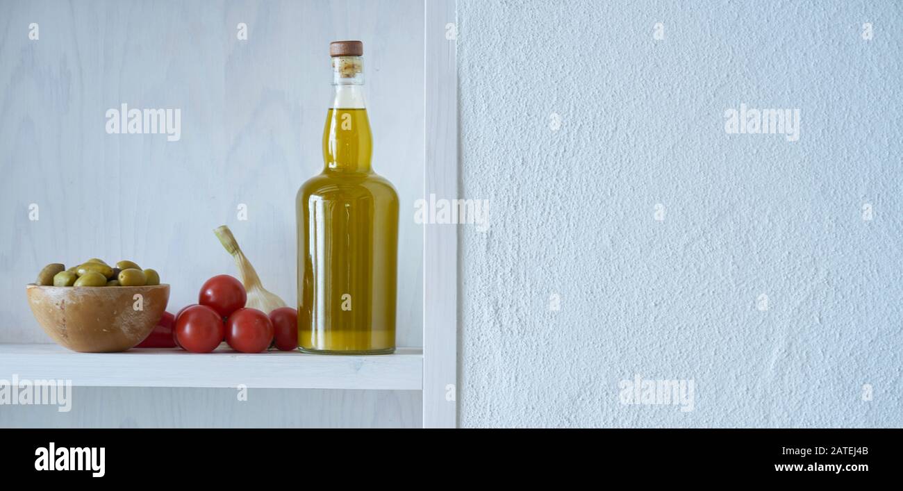 panoramic picture from a bottle of healthy organic olive oil on shelf ...