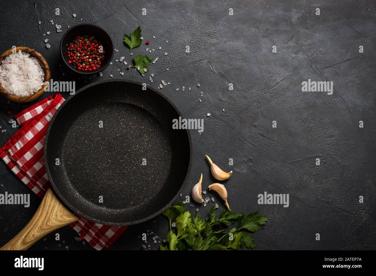 Food cooking background on black table Stock Photo - Alamy