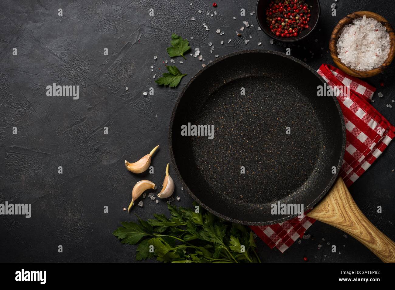 Food cooking background on black table Stock Photo - Alamy