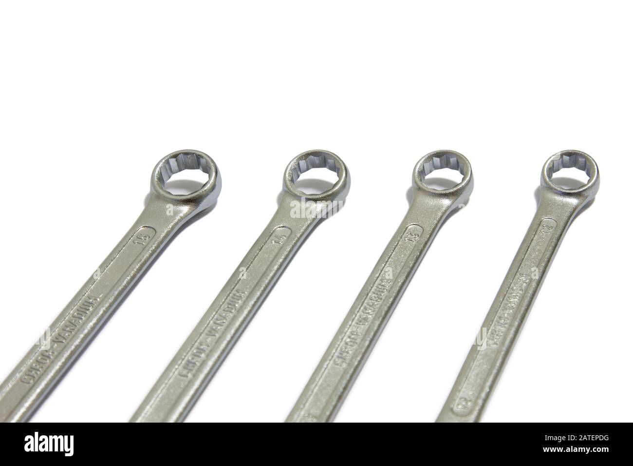 Four isolated spanners Stock Photo - Alamy