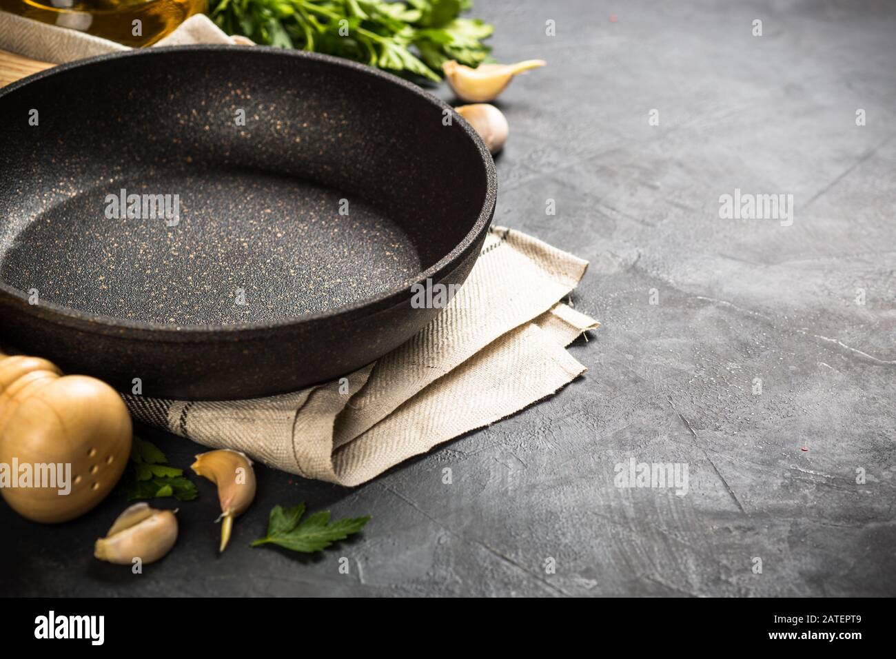 Food cooking background on black table Stock Photo - Alamy