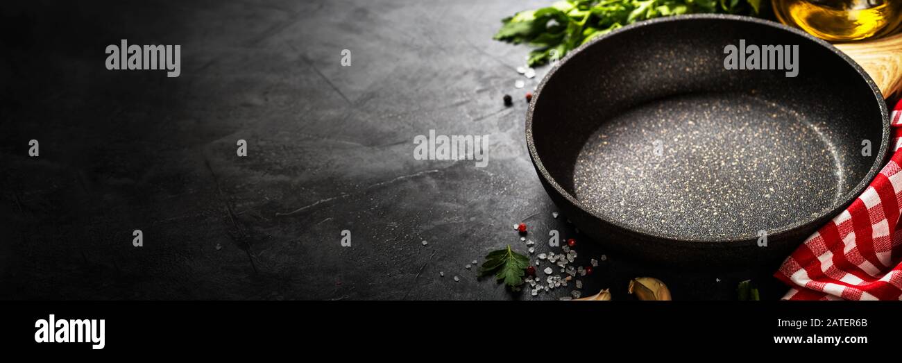 Food cooking background on black table Stock Photo - Alamy