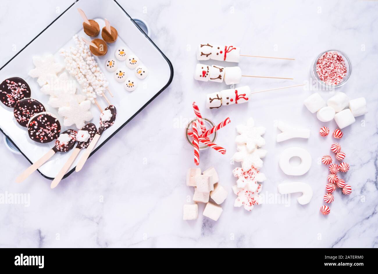Flat lay. Variety of marshmallow toppings with peppermint and chocolate ...