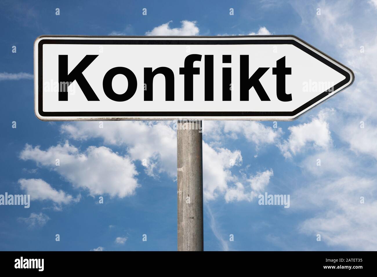 Detail photo of a signpost with the inscription Konflikt (Conflict ...