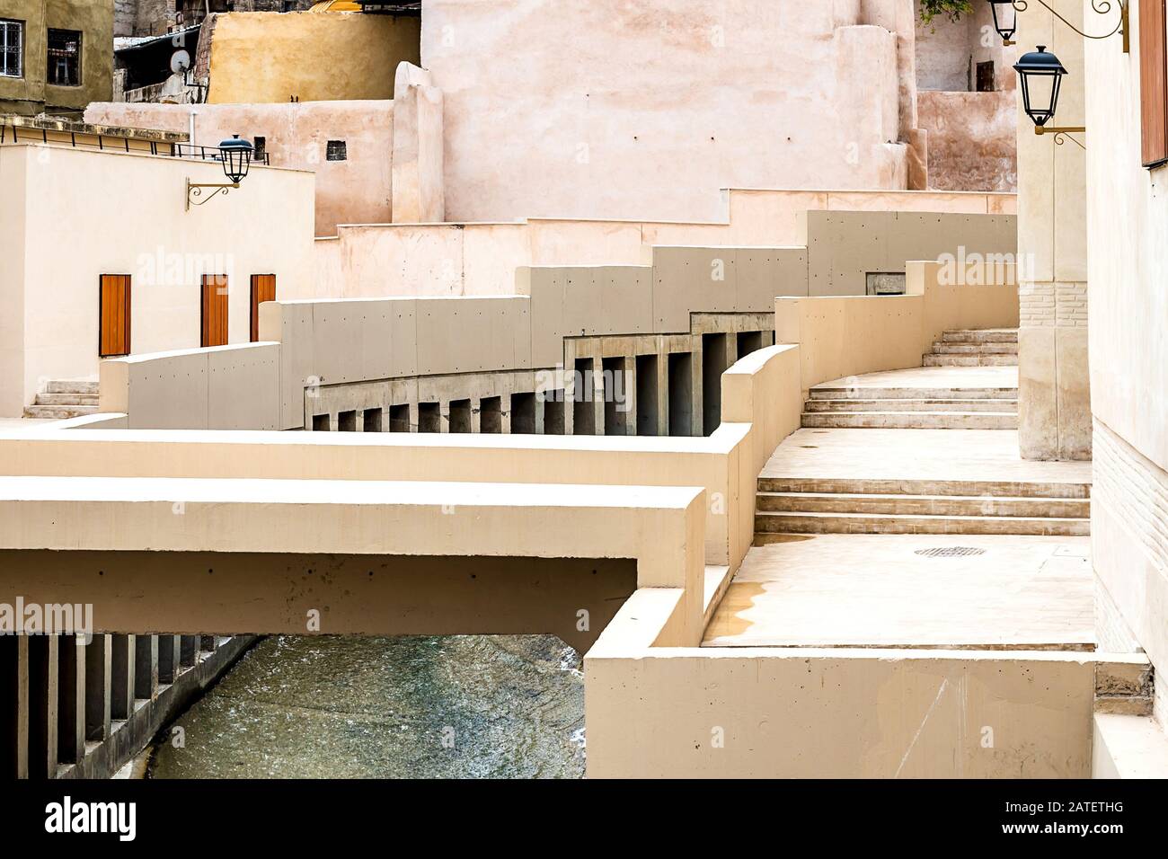The streets of the old town of Fez, which are locals and children ...