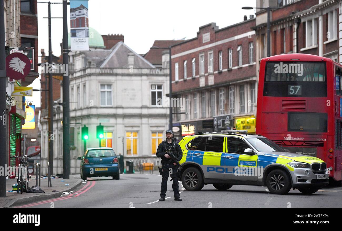 Armed police at the scene in Streatham High Road, south London after a ...