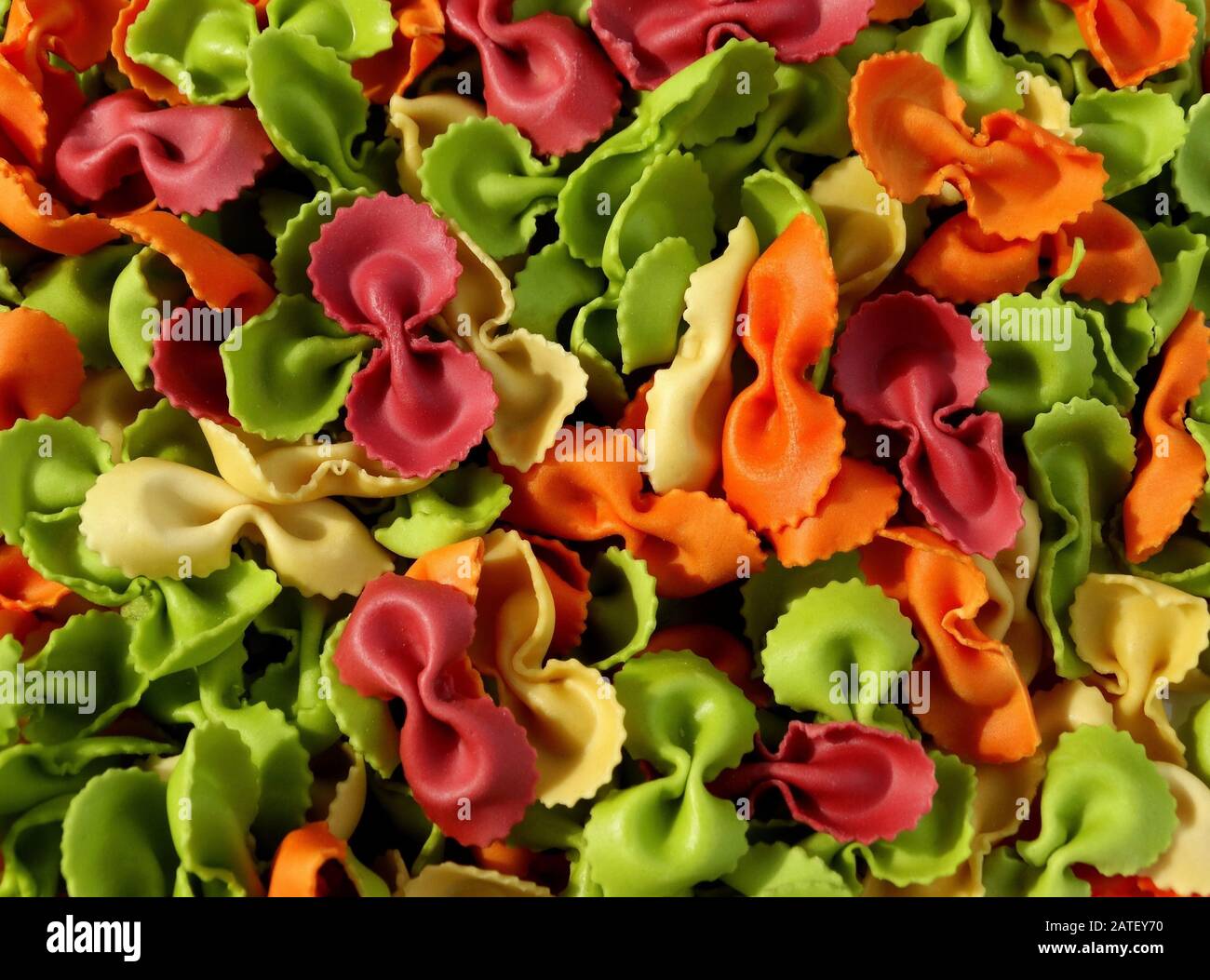 Colorful bow Pasta red green orange yellow Stock Photo - Alamy