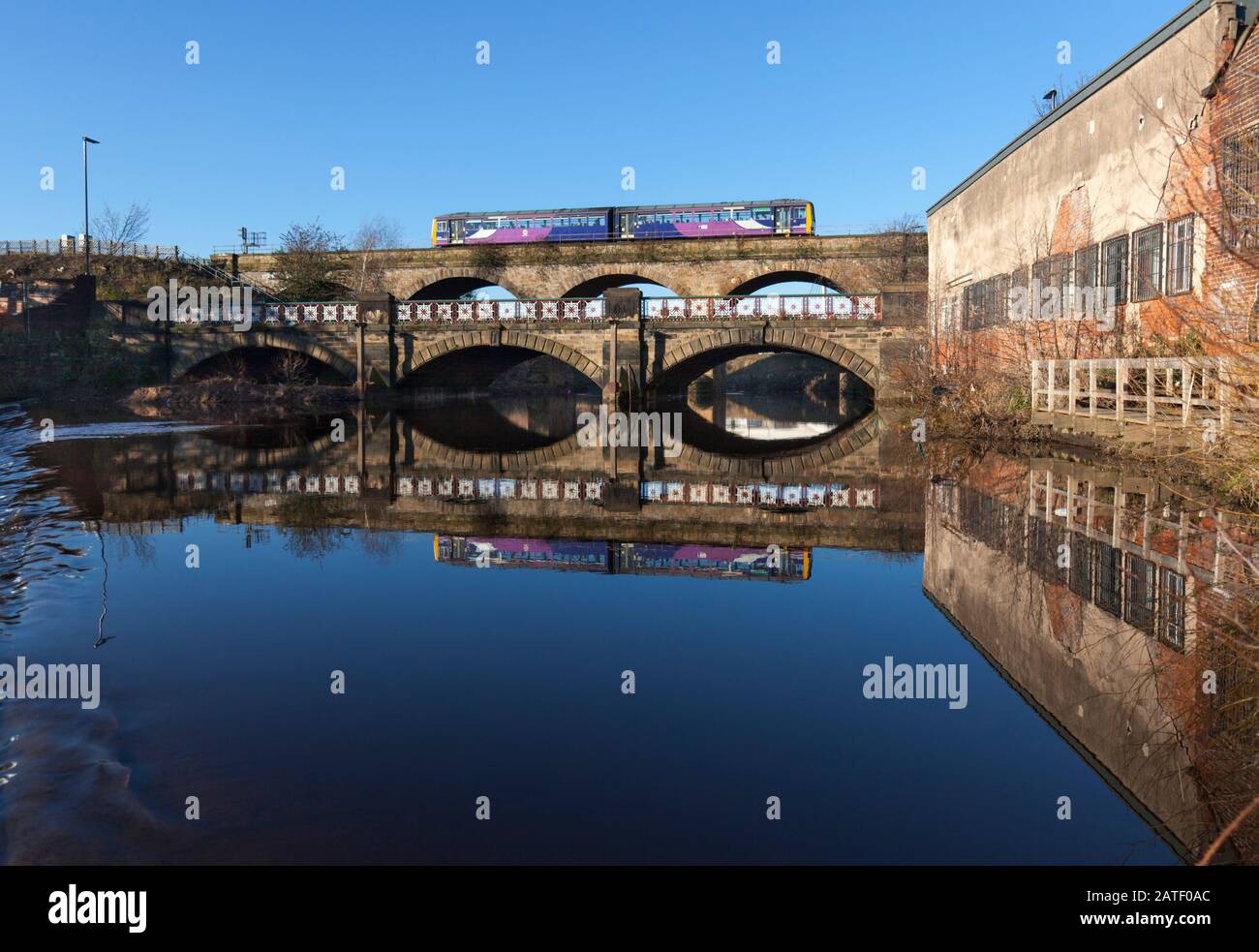 Arriva Northern Rail class 144 pacer train crossing the viaduct at ...
