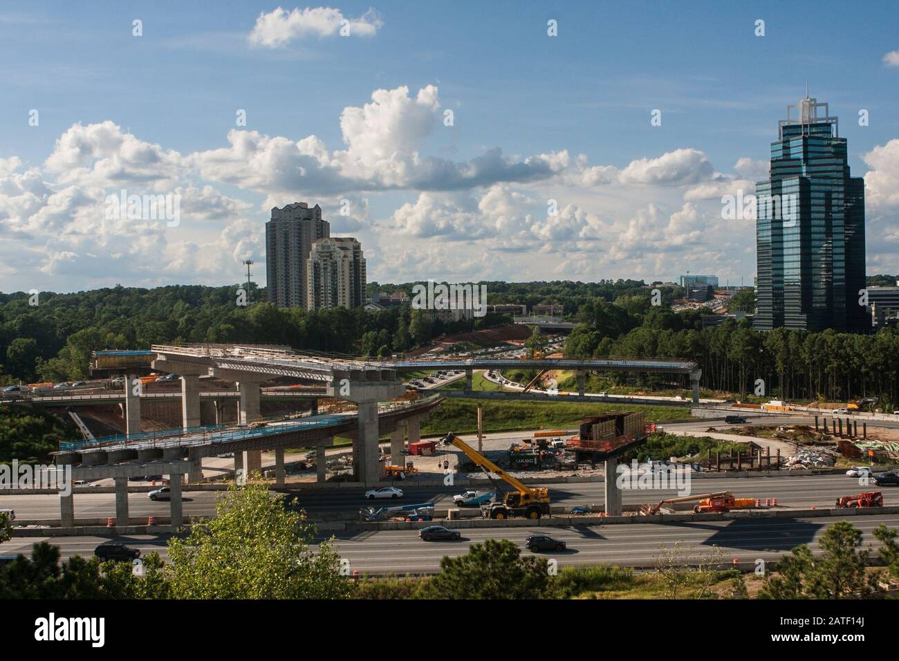 Bridge overpasses are under construction at the intersection of GA 400 ...