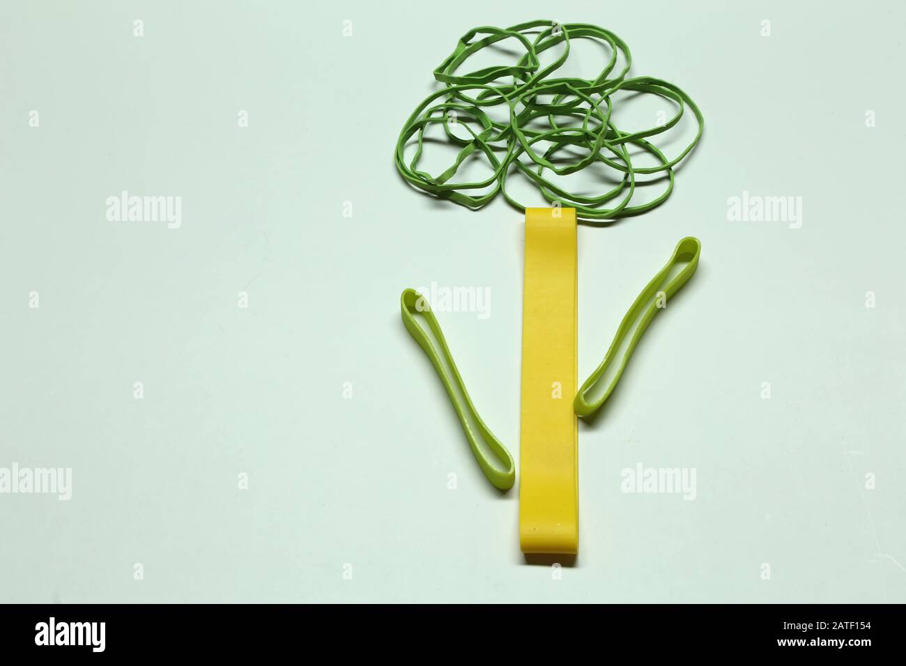Green tree made of colored rubber bands Stock Photo - Alamy