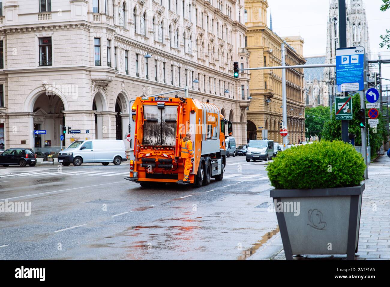 view if trash garbage truck at vienna street Stock Photo - Alamy