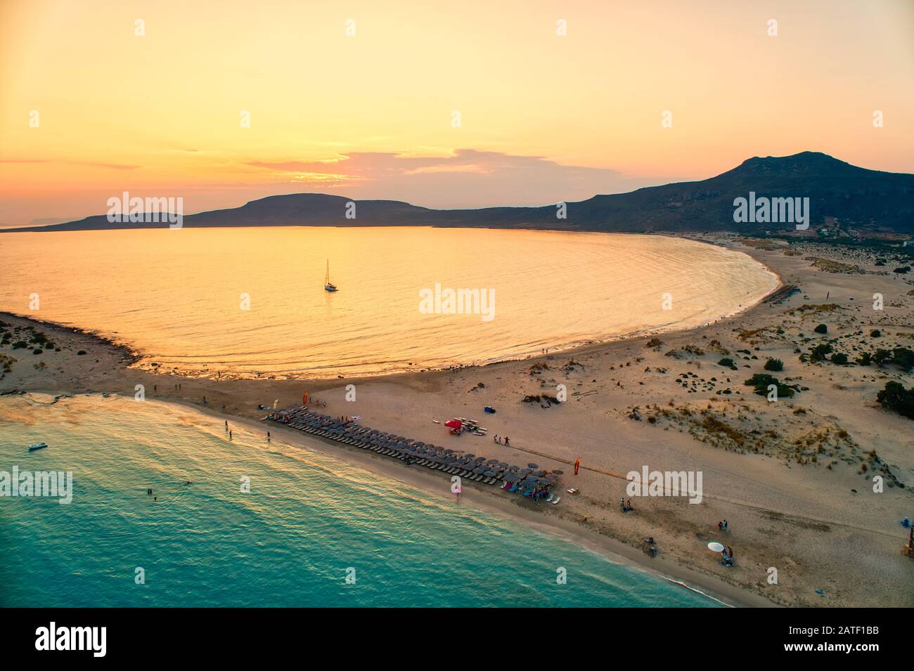 Aerial view of Simos beach at sunset in Elafonisos island in Greece ...
