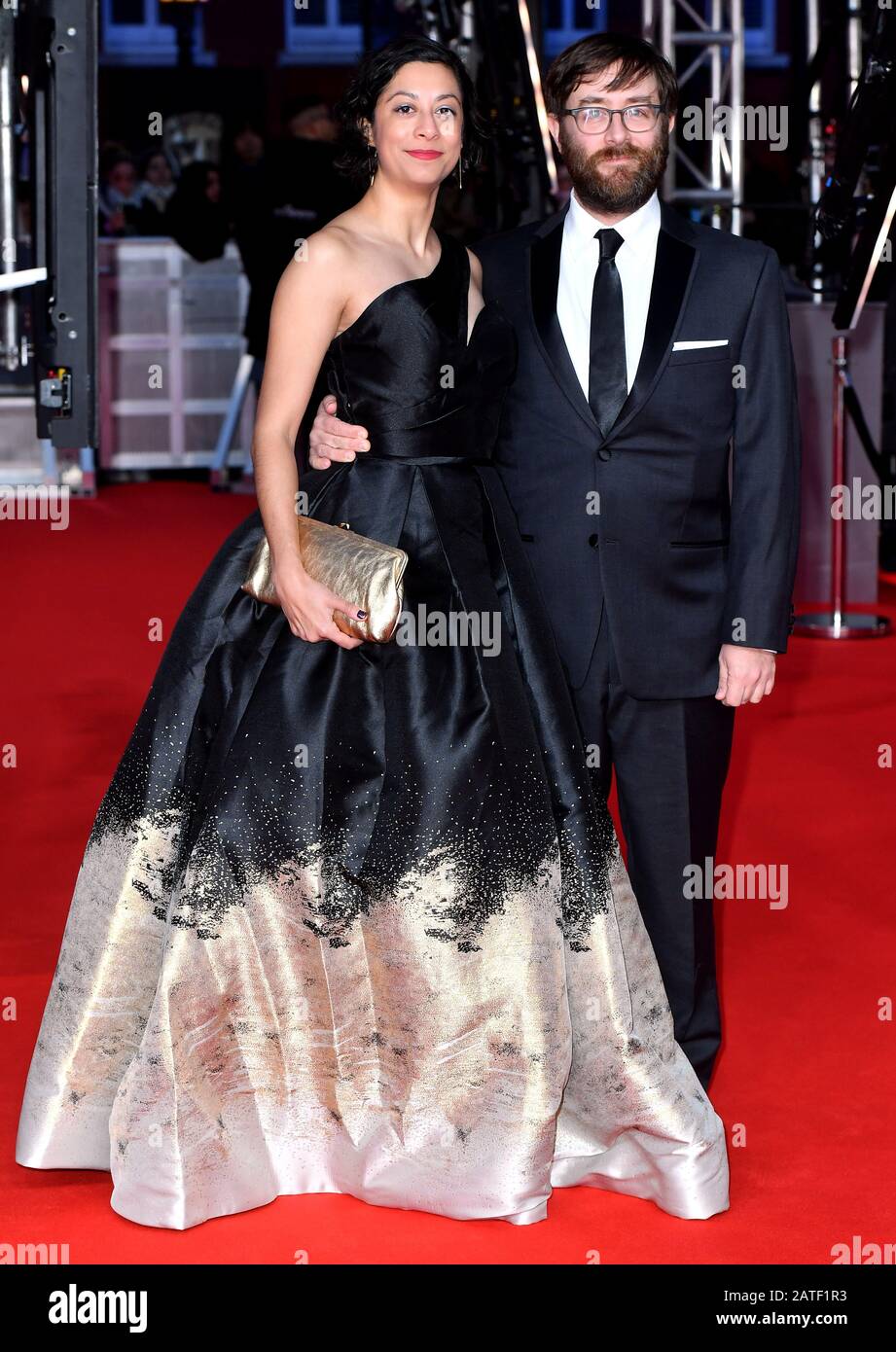 Jeff Reichert and guest attending the 73rd British Academy Film Awards ...