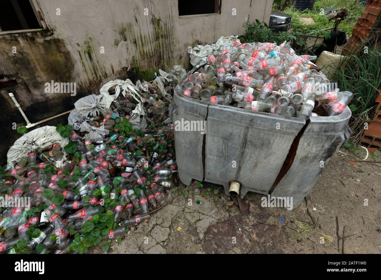 Glass bottle trash waste Stock Photo - Alamy