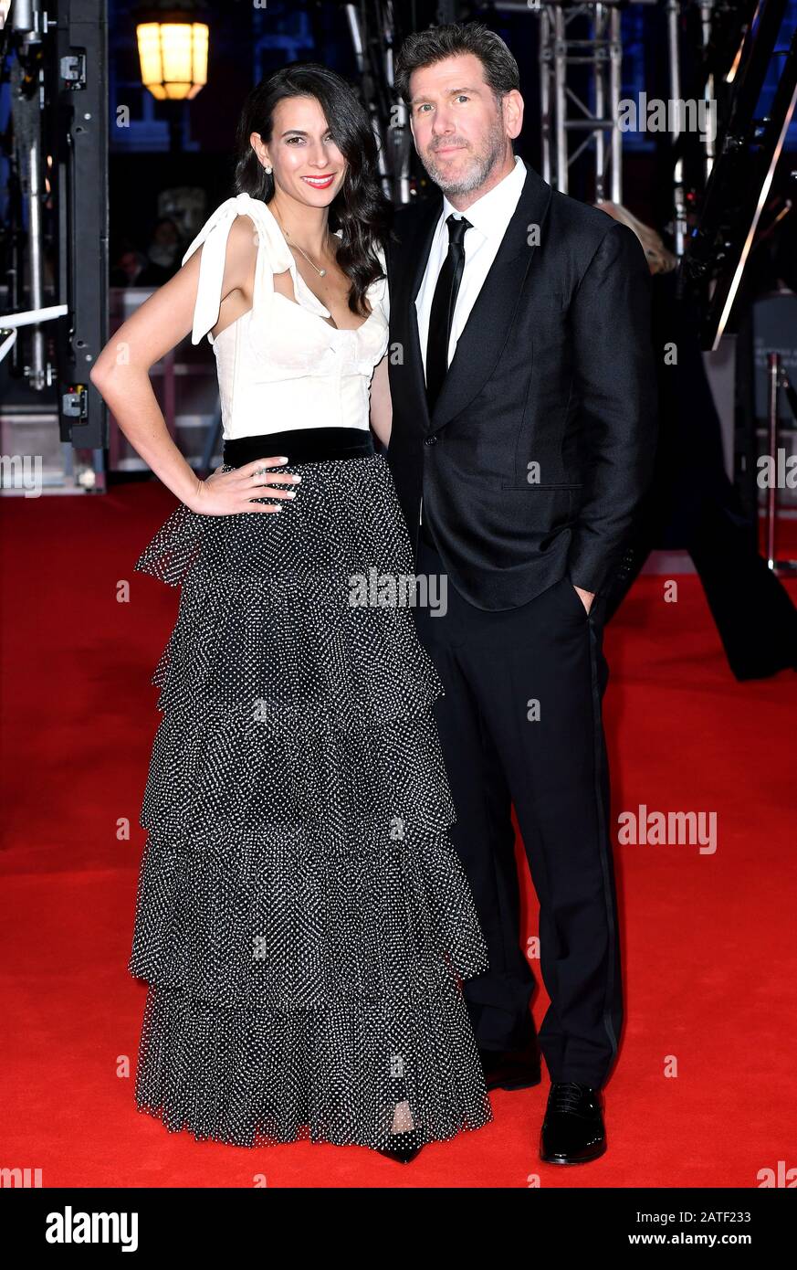 Lawrence Sher and guest attending the 73rd British Academy Film Awards ...