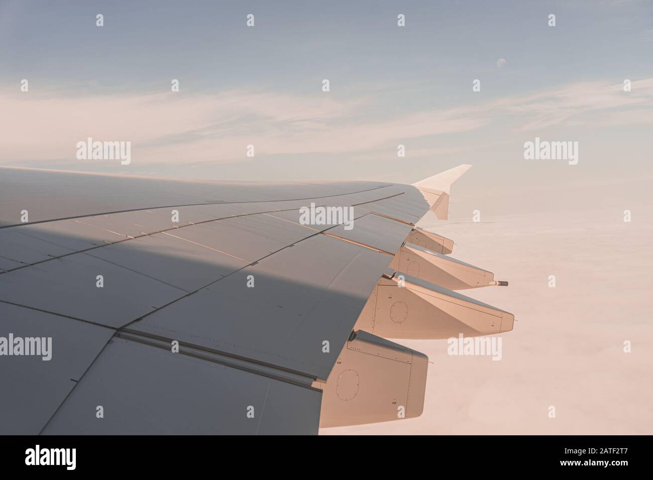 airplane wing through the airplane window Stock Photo - Alamy