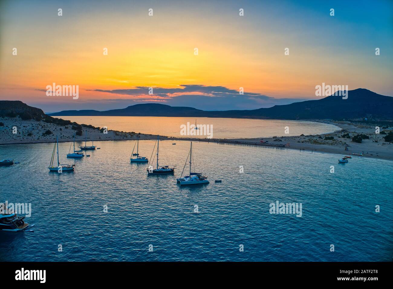 Aerial view of Simos beach at sunset in Elafonisos island in Greece ...
