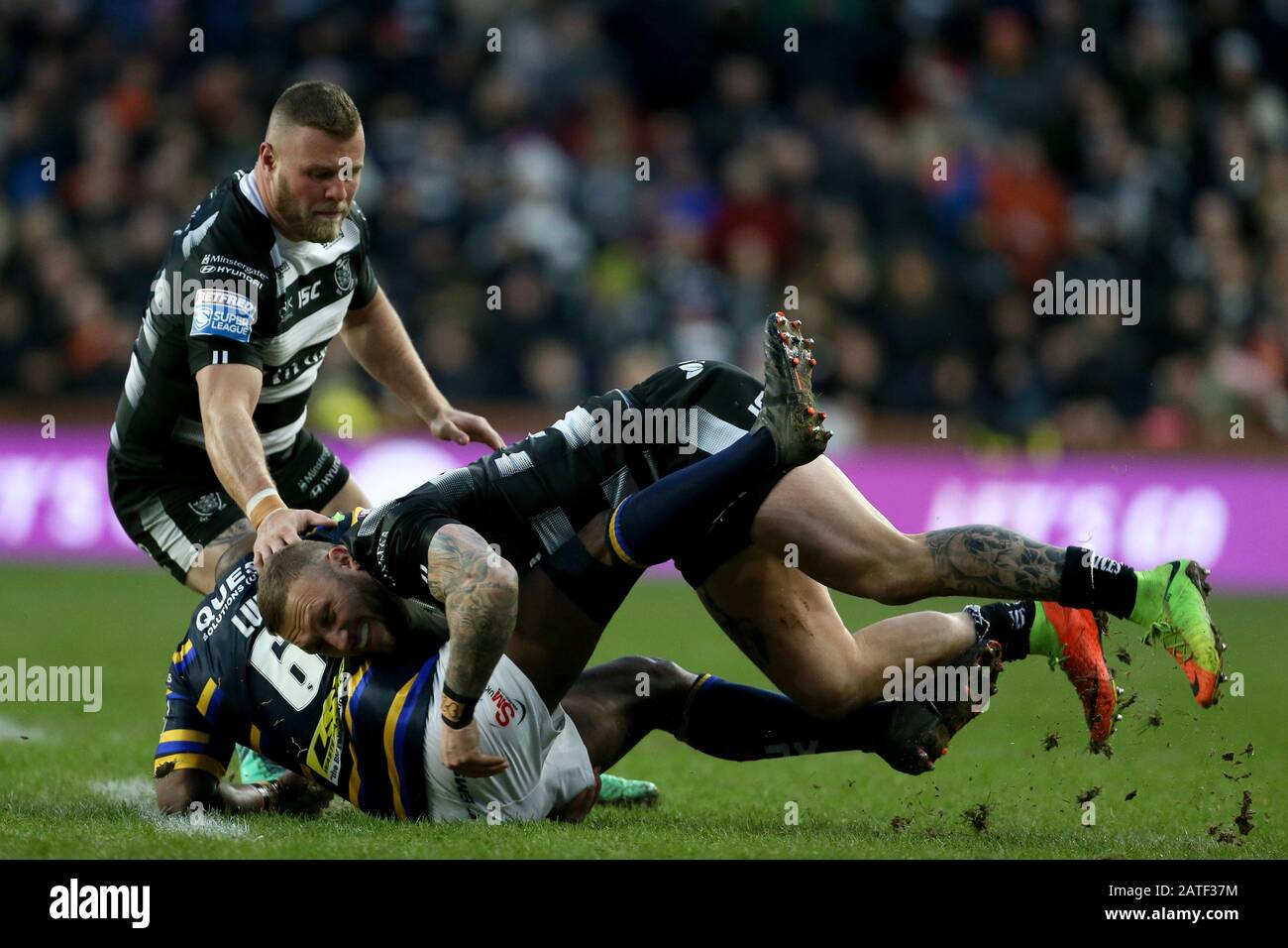 Hull Fc Marc Sneyd tackles Leeds Rhino's Robert Lui during the Betfred ...