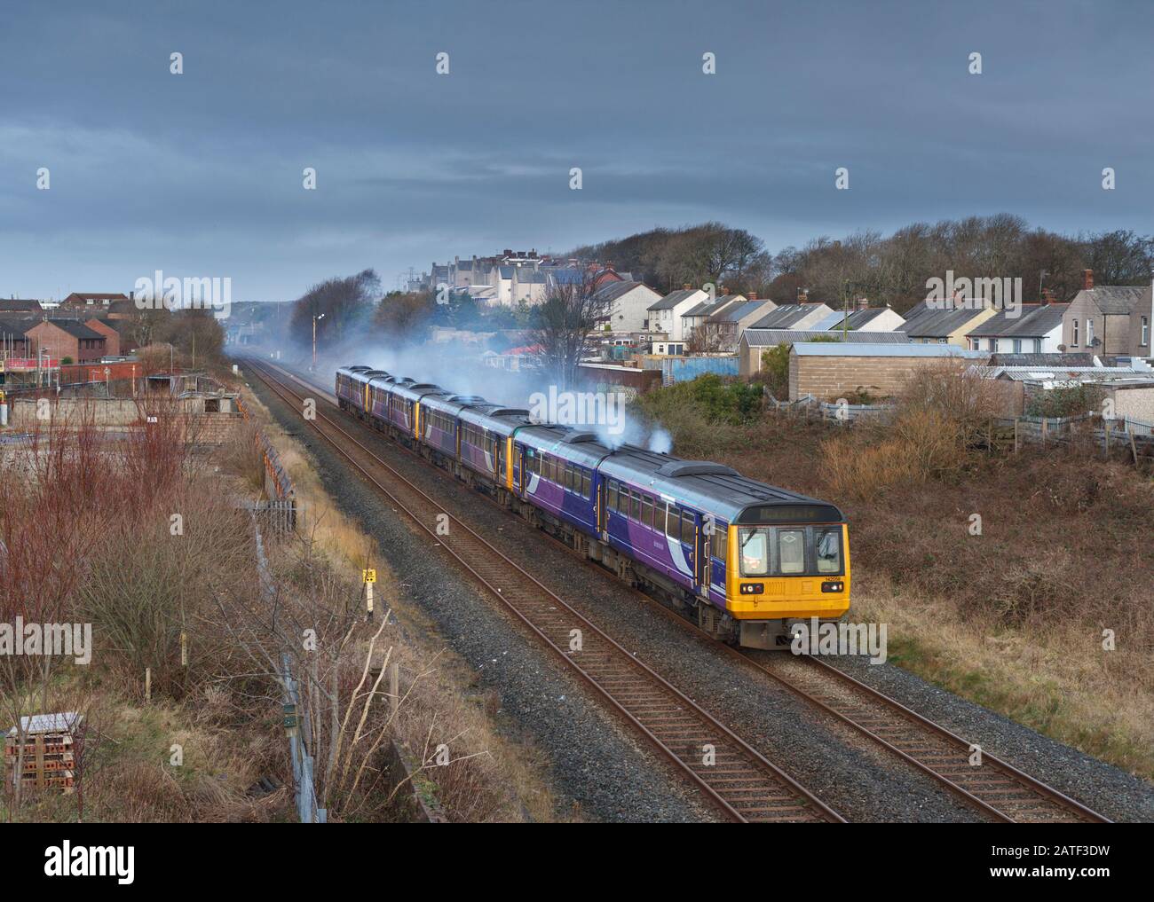4 Withdrawn Arriva Northern rail class 142 pacer trains departing from Barrow In Furness heading ...