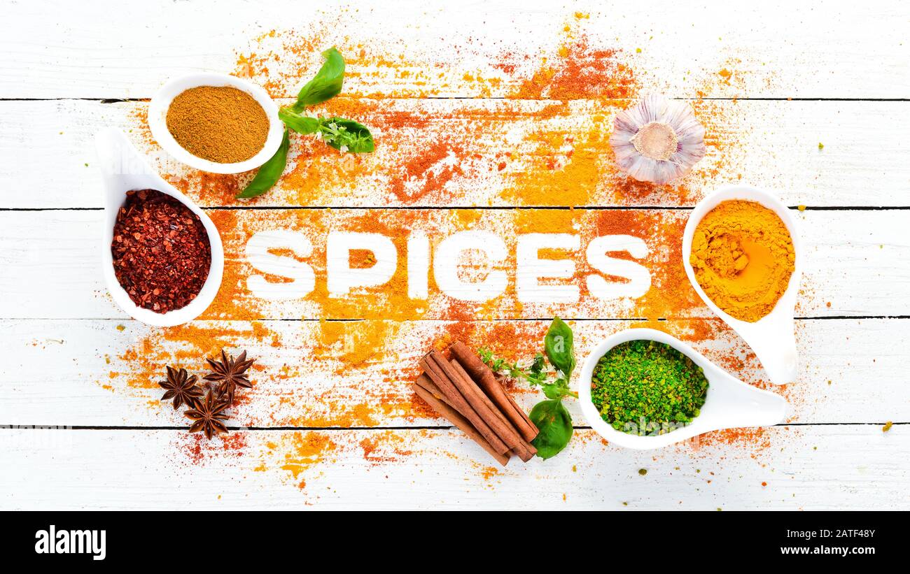 Various spices on white background. The word "spice" Indian spices. Top ...