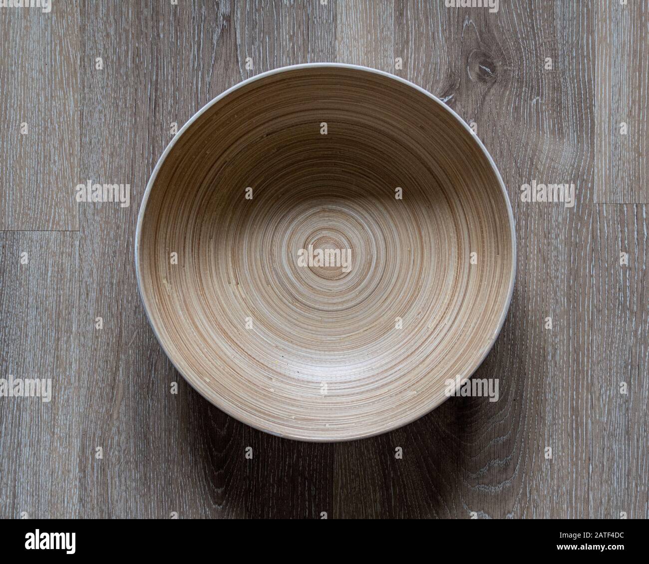 wooden bowl on wooden table from above Stock Photo - Alamy