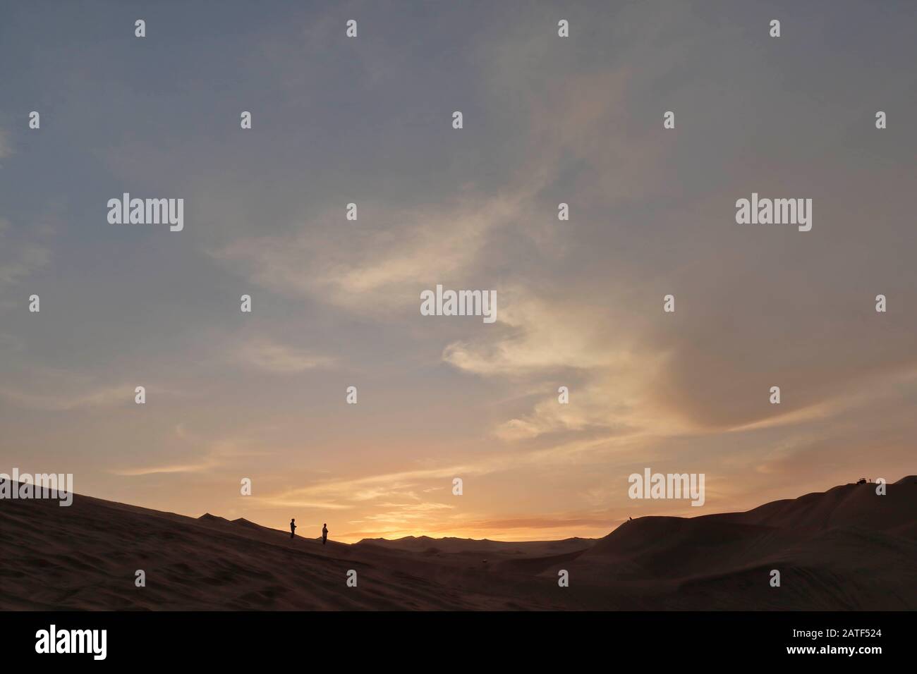 View of the Ica desert from the Huacachina during sunset with the first ...